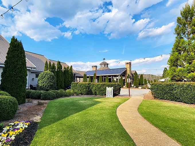 Manicured lawns and winding pathways lead you through grounds that feel like a European estate vacation.