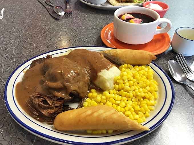 Pot roast dinner with all the fixings reminds you why grandma's cooking became the gold standard we chase.