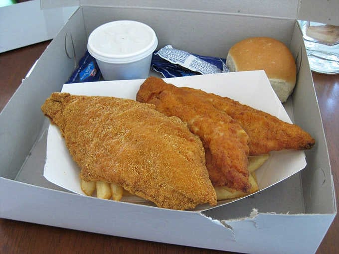 Golden fried catfish so perfectly crispy it could make a Southern grandmother nod with quiet approval.