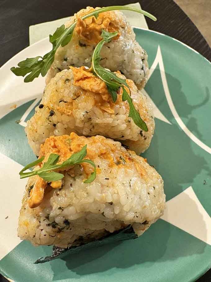 These rice triangles topped with salmon are like edible architecture, beautiful enough to photograph but too delicious to resist eating immediately.