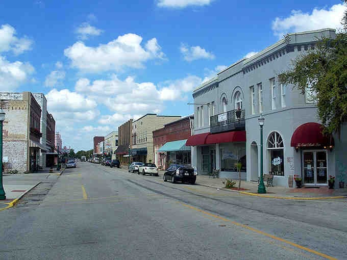Historic buildings wear their age gracefully, standing shoulder to shoulder like veterans at a reunion parade.
