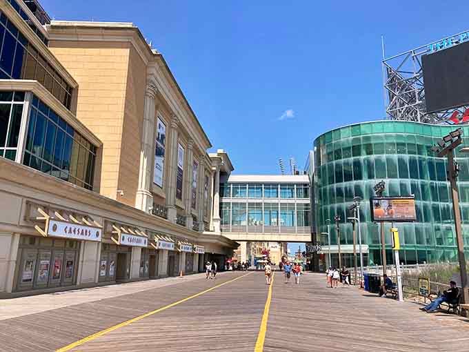Classic boardwalk buildings stand shoulder to shoulder like old friends sharing stories under that brilliant blue sky.