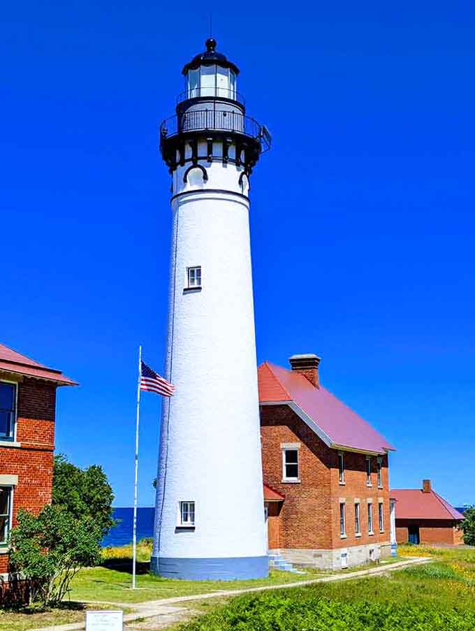 When a lighthouse stands this crisp against blue sky, even your camera feels inadequate for the task.