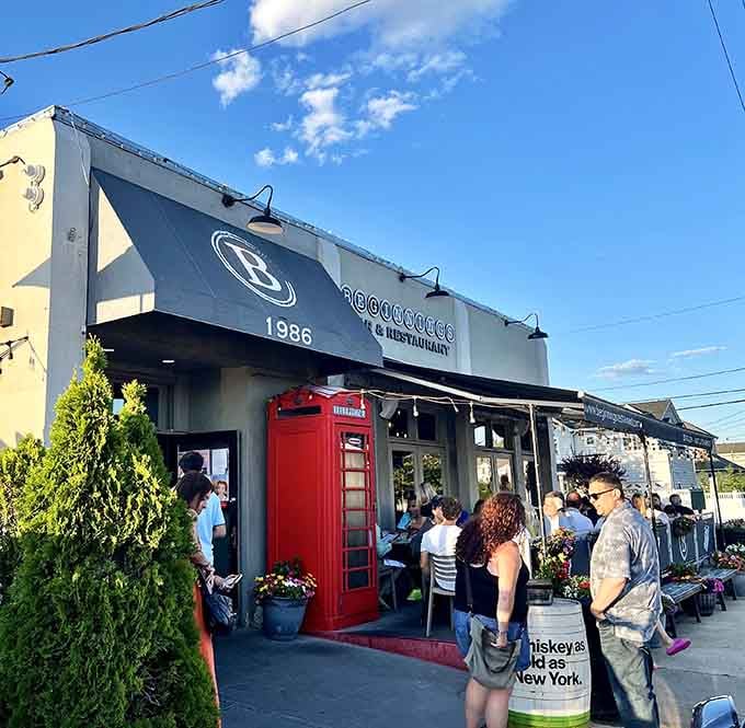 That classic red British phone booth isn't just decoration&mdash;it's your passport to authentic fish and chips territory.