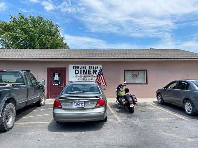 A full parking lot and American flag flying proudly tell you the locals know something worth discovering at this unassuming spot.