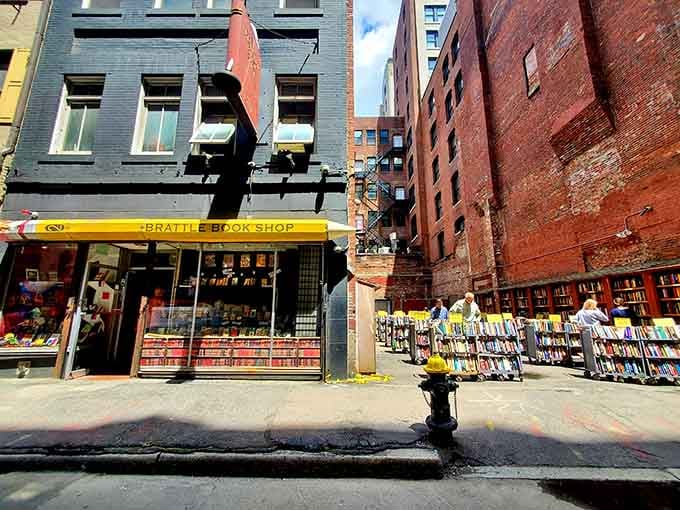 Yellow awnings and sidewalk book carts spill literary treasures onto the street like a reader's dream come true.