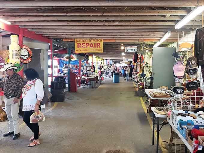 That vintage "Repair" sign points shoppers deeper into this maze where every turn reveals another vendor's carefully curated collection of everything.