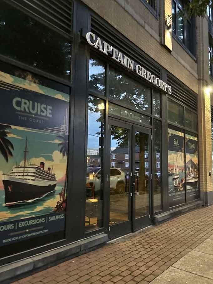 Vintage cruise posters in the windows promise nautical adventures without the risk of actual seasickness or icebergs.