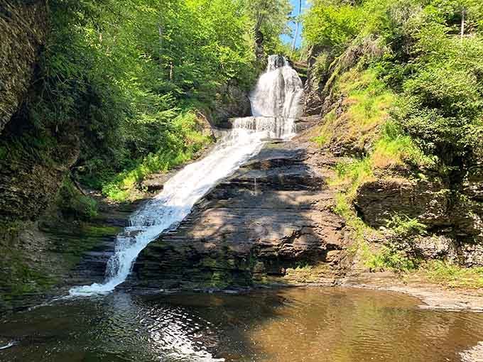 Water rushes down the dark stone face in powerful cascades, creating that soothing soundtrack nature does so well.