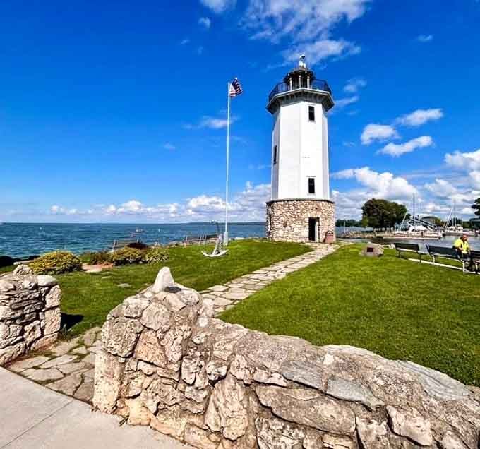 This stone tower rising from manicured grass looks like Rapunzel's hideaway, minus the long hair but with better lake views.