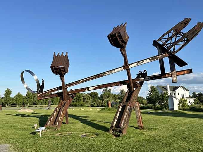 Industrial equipment transformed into towering art creates a whimsical giant that seems ready to march across fields.