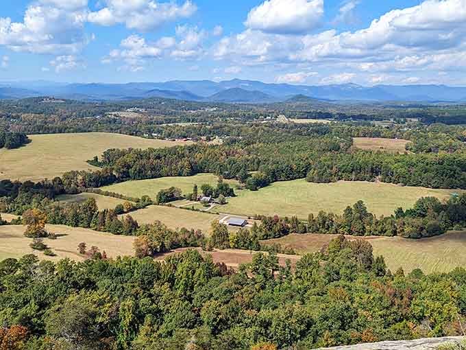 Rolling farmland stretches toward distant mountains like a patchwork quilt stitched together by generations of careful hands.