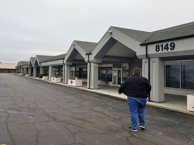 A shopper strolls past charming storefronts on a mission to uncover hidden gems and amazing deals.