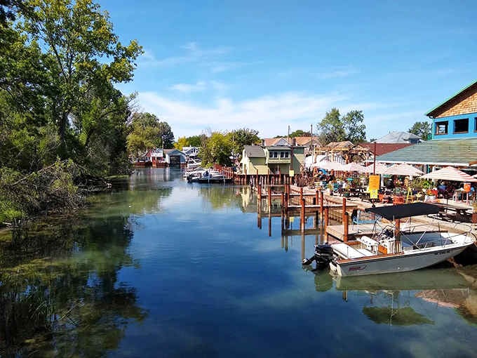 Colorful houses on stilts line the waterway like a secret neighborhood where boats replace cars and adventure replaces routine completely.