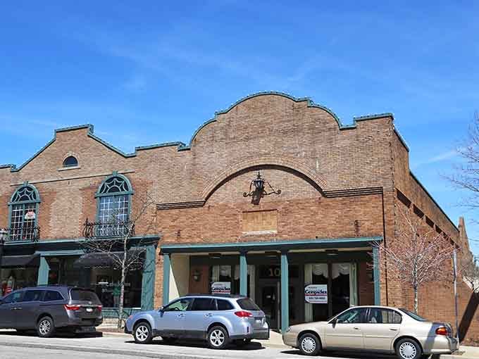 That distinctive curved brick facade adds architectural character to downtown streets where history meets modern community life.