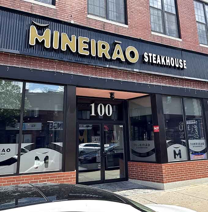 Mineir&atilde;o's bold lettering announces Brazilian steakhouse traditions have found a welcoming home on this bustling urban street corner.