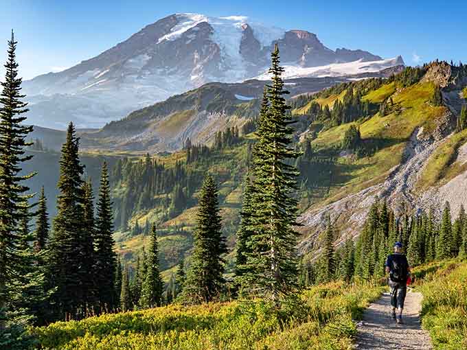 A lone hiker faces the mighty mountain, reminding us why people write songs about the great outdoors.