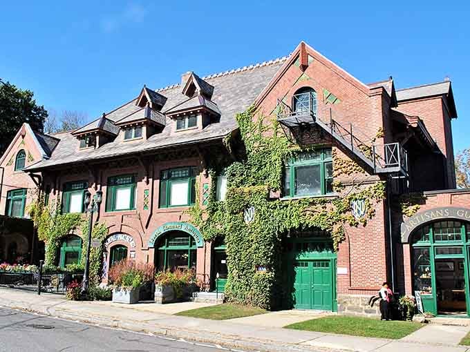 Ivy-covered brick buildings whisper tales of academic excellence while green shutters frame windows to countless scholarly dreams and discoveries.