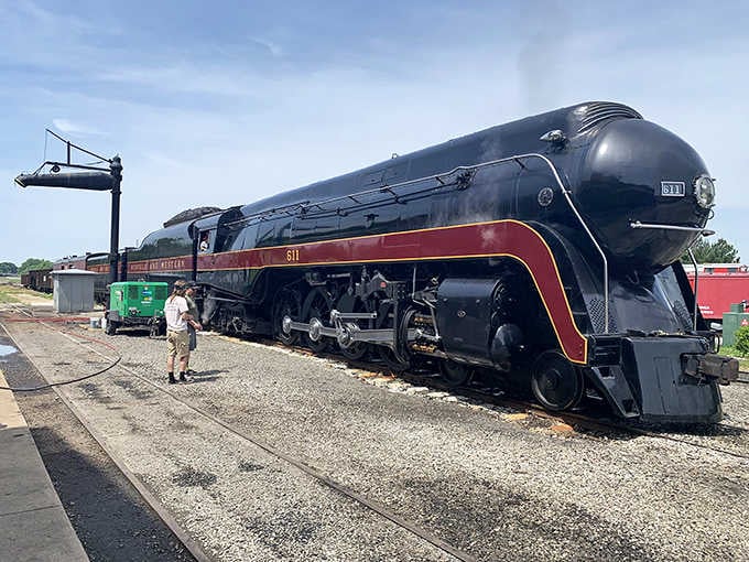 This streamlined black locomotive with burgundy trim represents the golden age of rail travel in all its Art Deco glory.
