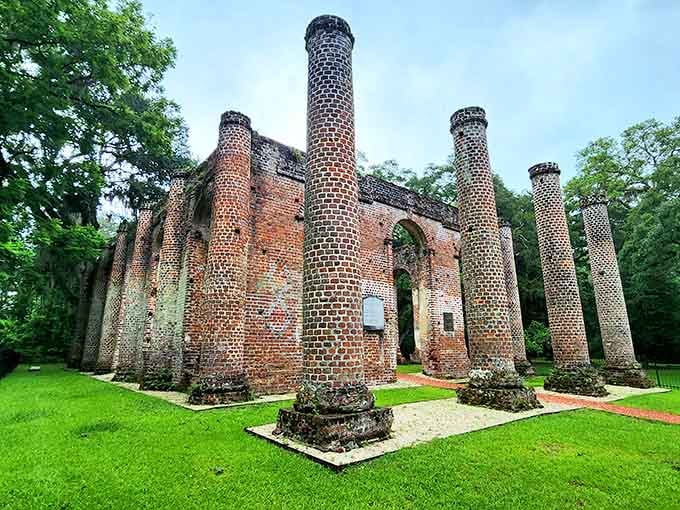 These towering brick columns stand like ancient sentinels, their weathered beauty telling stories of centuries past and gone.