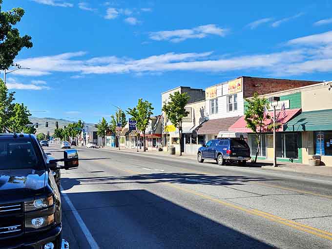 Omak's main drag stretches toward distant peaks, offering that classic Western town vibe without the Hollywood fakery.