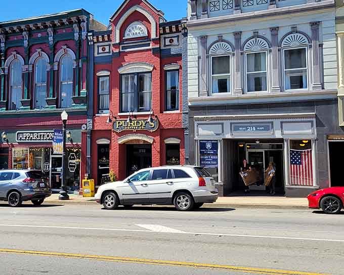 Victorian buildings stand shoulder-to-shoulder in cheerful colors, like old friends gathered for their weekly coffee date.