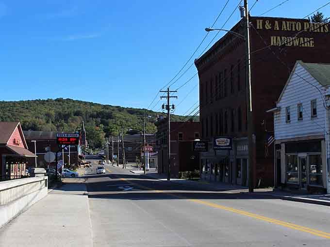 Mountains embrace this main street like protective arms, creating a valley town where worries seem smaller somehow.