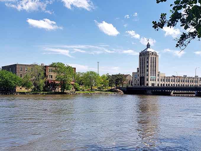 The river reflects Art Deco towers that have watched over this community through generations of good living.