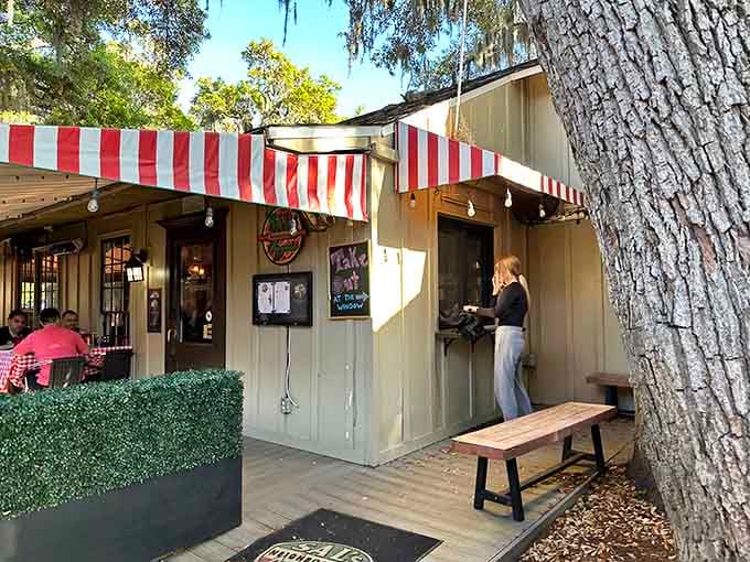 Red checkered tablecloths and that cozy pizzeria vibe transport you straight to a New York neighborhood joint.