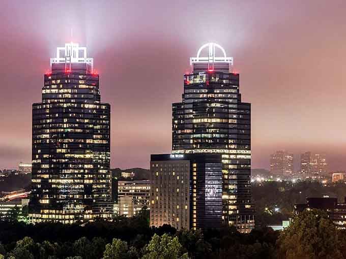 Sandy Springs' twin towers glow against the twilight sky like beacons guiding you home after a perfect day exploring.