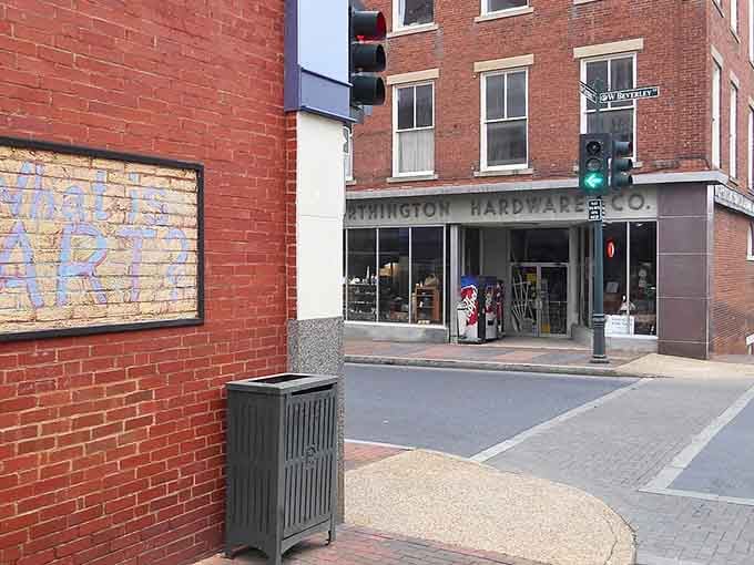 The vintage hardware store sign and brick buildings capture small-town European charm beautifully.