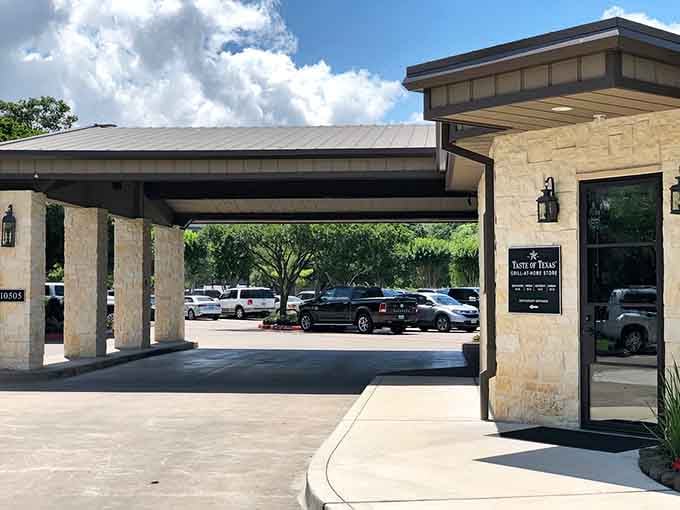 That covered entrance with limestone pillars promises serious steaks ahead—like arriving at a ranch that takes beef very seriously.