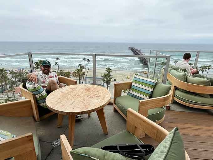 Wooden deck loungers face the Pacific like front-row seats to nature's greatest daily performance.