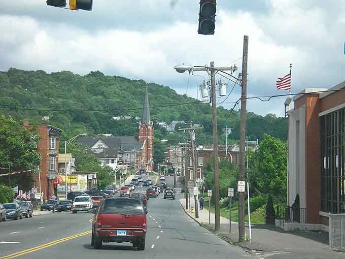 Rolling hills embrace Waterbury's main street where small-city living means knowing your neighbors and stretching your retirement income.