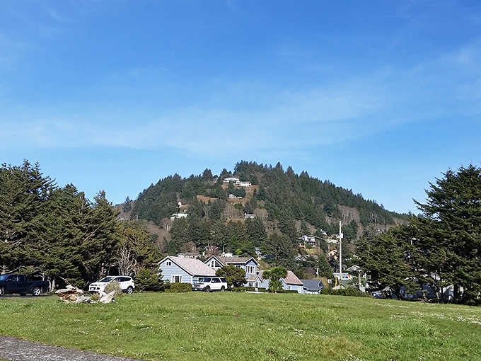 Forested hills embrace this tiny coastal community where neighbors still wave and strangers become friends quickly.