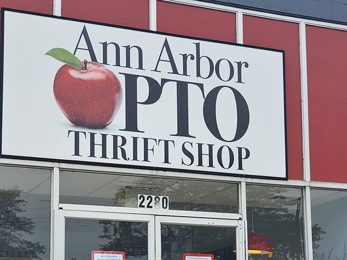 That bright red apple against white creates a sign so classic, it could teach modern designers a thing or two.