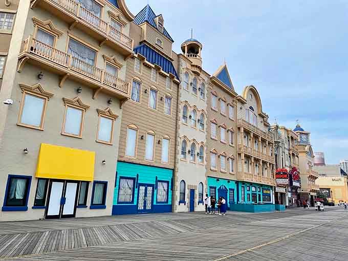 Victorian charm lines these historic buildings, their ornate details whispering stories of countless summers spent by the shore.