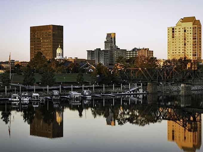 The Savannah River reflects the city skyline like a mirror, doubling the beauty at golden hour.