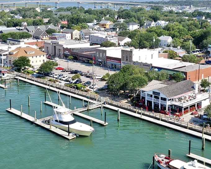 The waterfront bustles with boats and possibility, where fresh seafood is measured in hours, not days.
