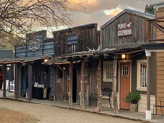Golden hour light bathes the rustic storefronts, creating the perfect backdrop for an authentic Western dining adventure.