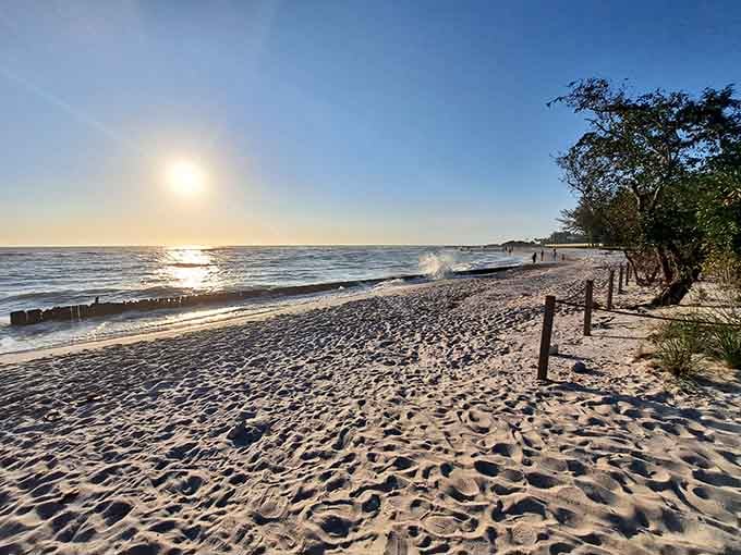 Golden hour transforms this quiet beach into a photographer's dream, with footprints telling stories in the sand.