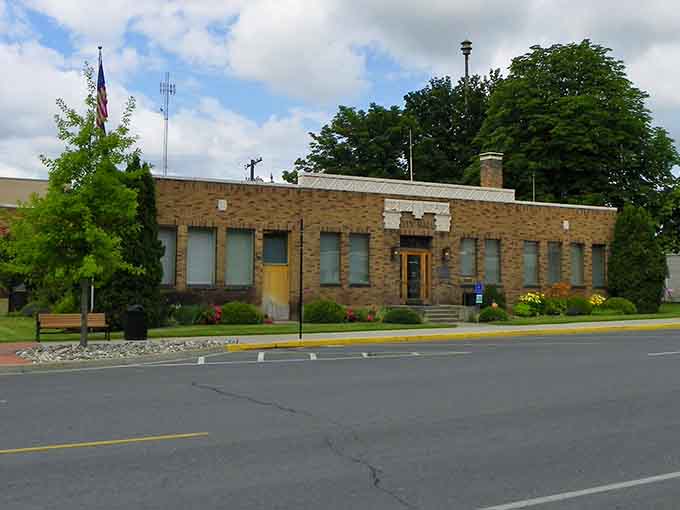 The sturdy brick building stands proudly on the corner, its Art Deco details speaking to an era of craftsmanship.