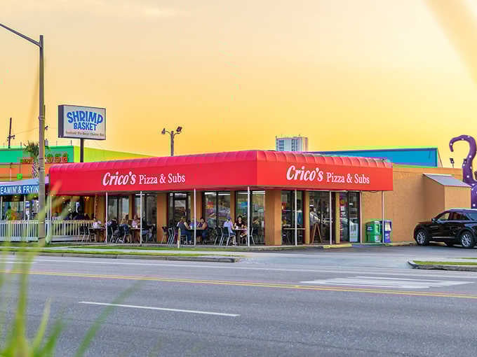 Golden hour at the shore, and that red canopy glows like a beacon guiding hungry folks to affordable Italian goodness.