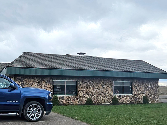 That distinctive stonework and green trim stand as reliable landmarks for anyone craving a perfectly grilled steak.