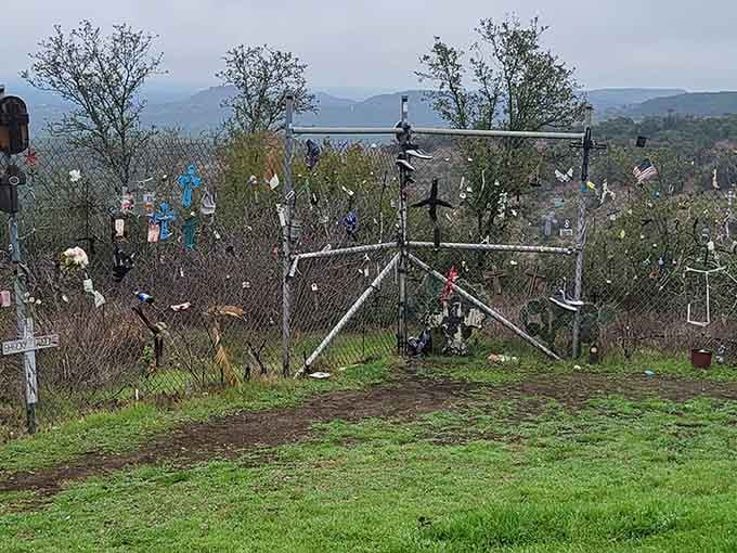 Colorful crosses and mementos transform this hillside cemetery into a touching tribute to lives remembered and honored.