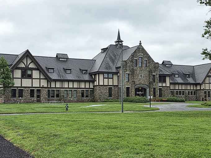 The sweeping driveway and grand architecture make you half expect to see Gatsby himself pulling up any minute.