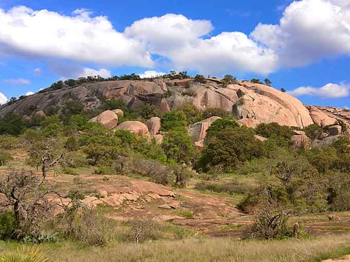 This massive ancient rock formation towers above the landscape, promising panoramic views that'll make the climb worthwhile.