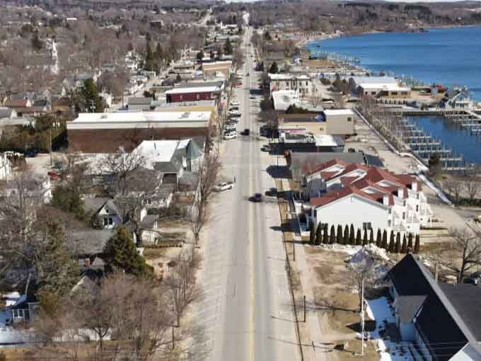 The main street runs straight to the waterfront, creating a perfect pathway between town life and lakeside serenity.