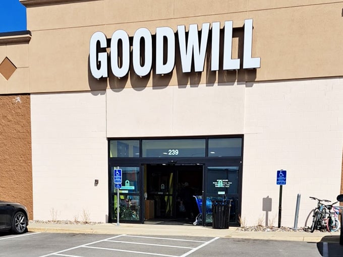 The clean, modern facade welcomes shoppers seeking quality secondhand items in a comfortable shopping environment.