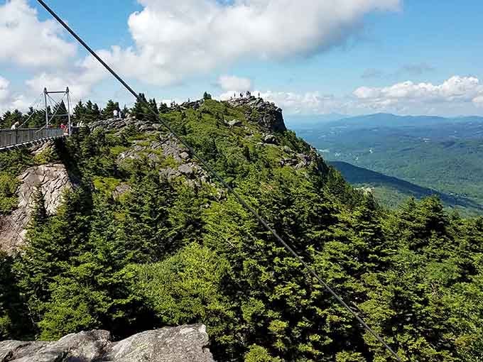 That famous swinging bridge connects two peaks with engineering marvel and heart-stopping views that'll make your knees wobble.